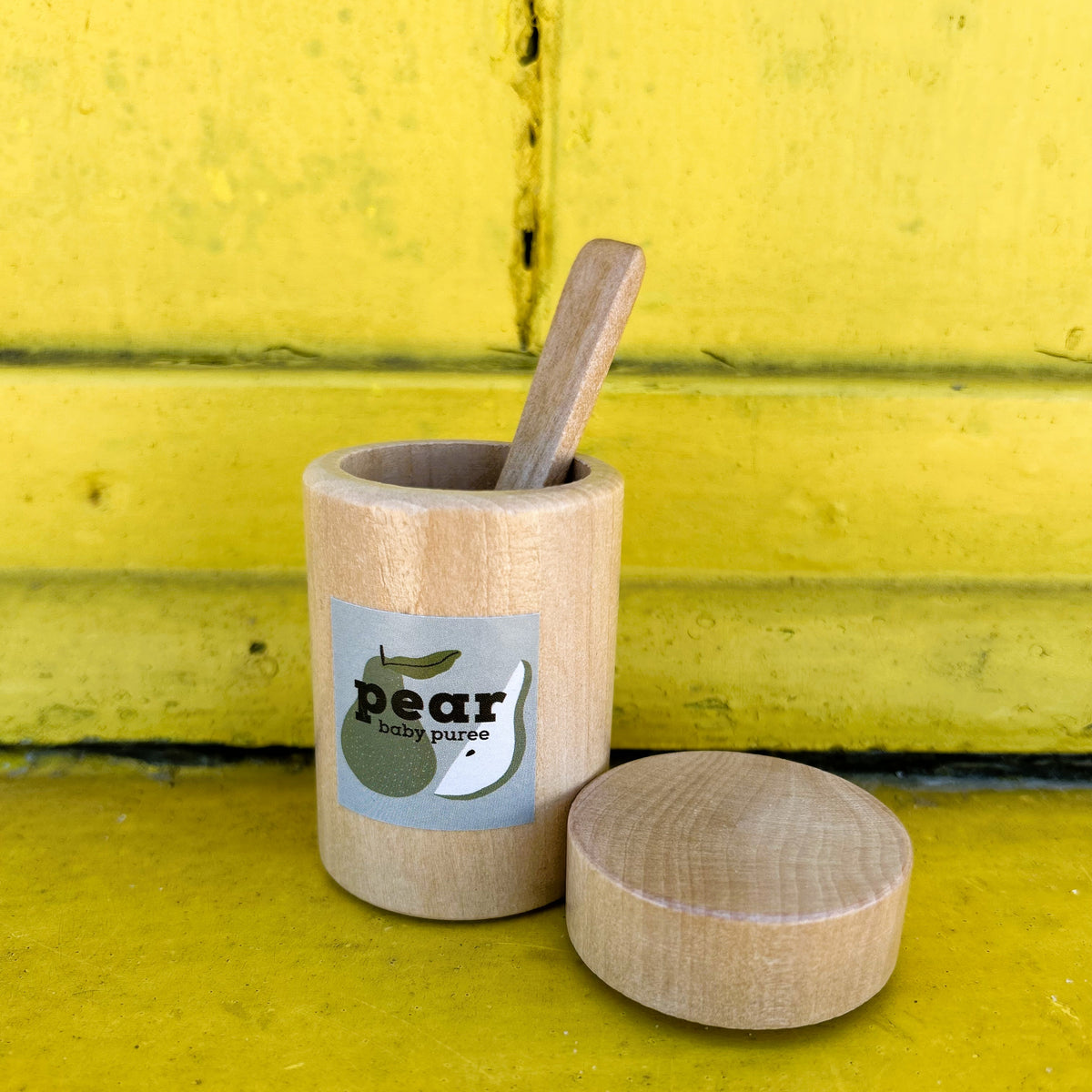 ICONIC WOODEN TOY - DOLL FEEDING PEAR PUREE | makemeiconic